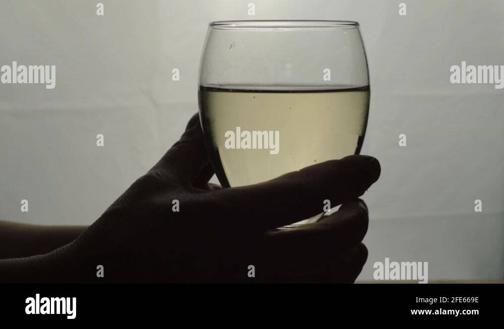 Two hands holding glass Stock Videos & Footage - HD and 4K Video Clips ...
