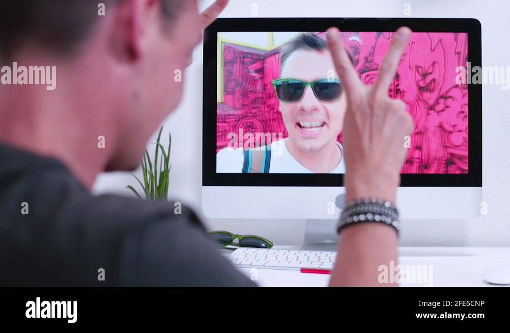 Two brothers are talking using a video call. Long distance exchange of ...