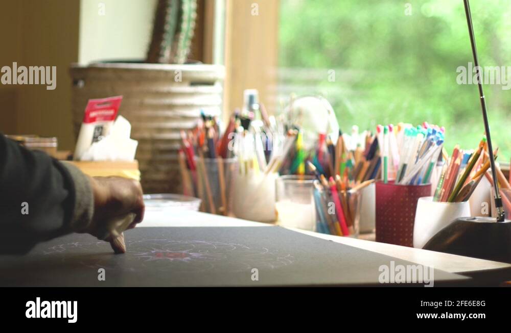 Finger pushing motion on a paper. artist creating an artwork with ...