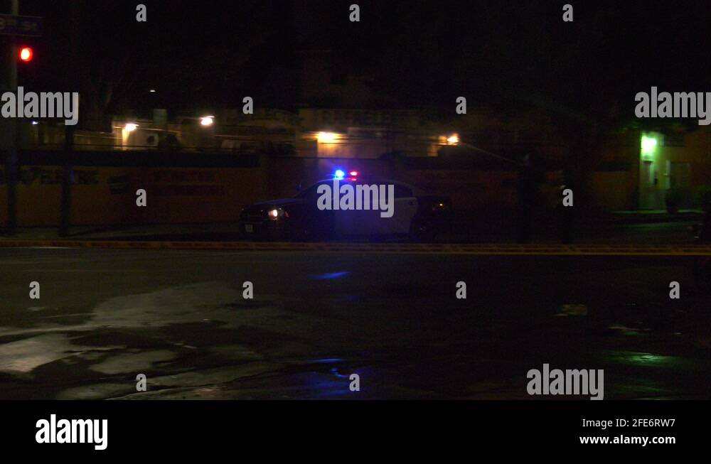 Police Car Arriving at Crime Scene Stock Video Footage - Alamy