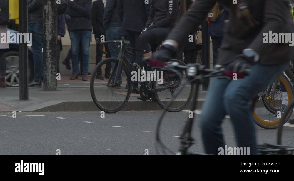 LONDON, UK: 07/02/2020: Cyclists Waiting At Traffic Lights On Busy ...