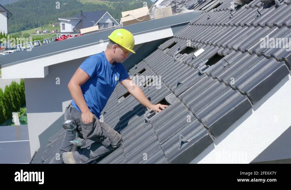 Man fixing roof tiles Stock Videos & Footage - HD and 4K Video Clips ...