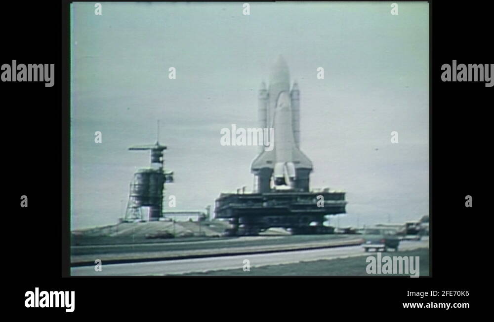 1990s: space shuttle on earth mover being brought to launchpad, space ...