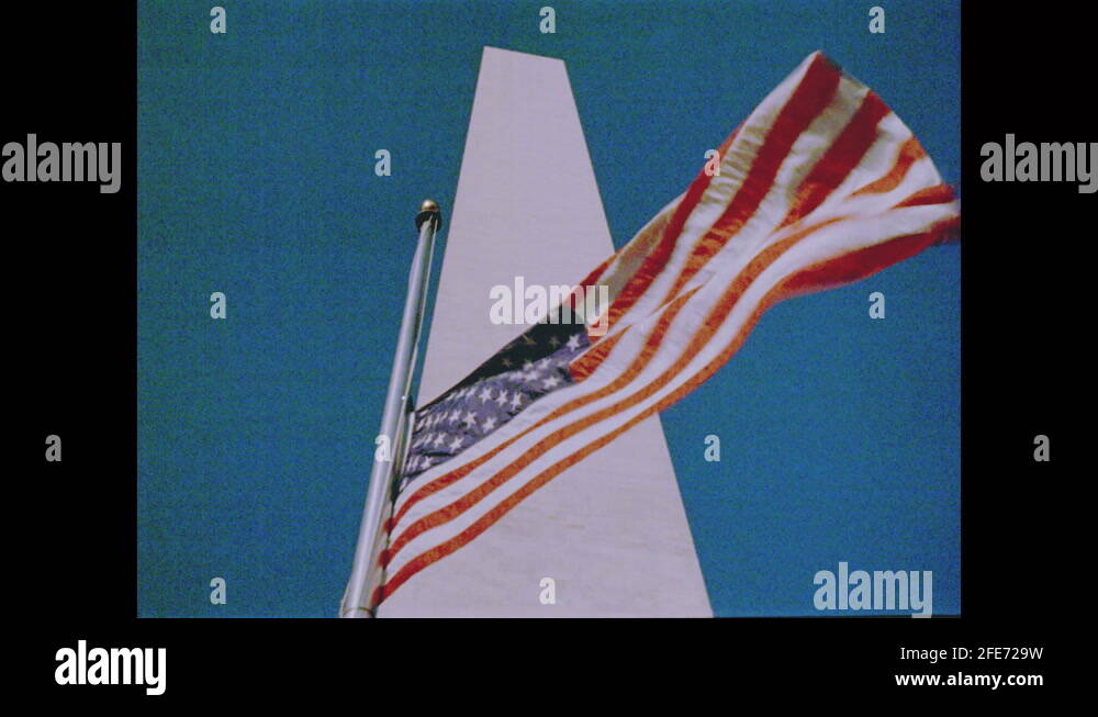 1960s: US flag flies at half-mast in front of the Washington Monument ...