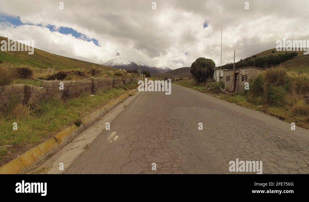 Driving car through black raining cloud fog on highway road trip ...