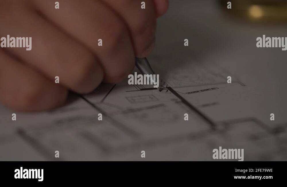 Architect's Hand Drawing Interior Design Plan With A Technical Pen ...
