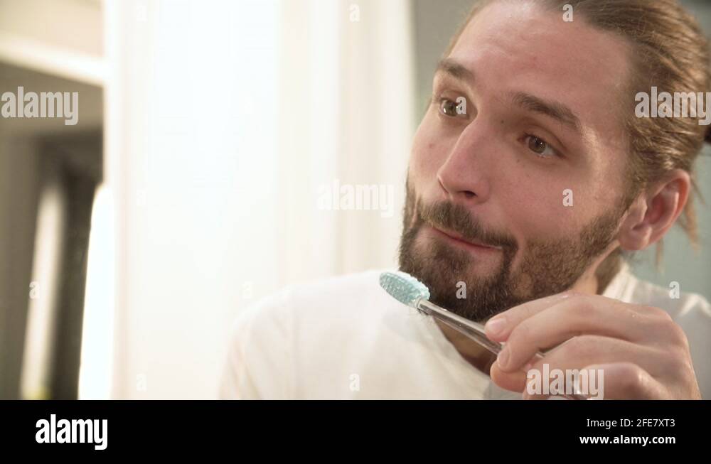 Man brushing teeth Stock Videos & Footage - HD and 4K Video Clips - Alamy