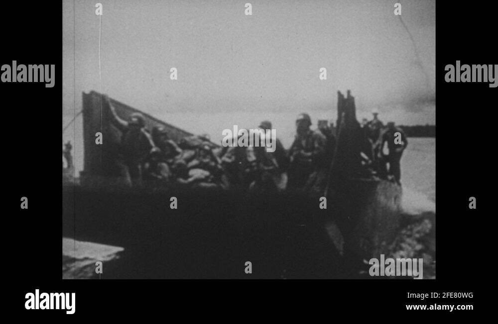 1940s: Ships land on shore, ramps deploy, soldiers disembark. Soldiers ...