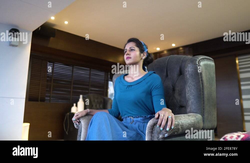 Female model sitting on chair Stock Videos & Footage - HD and 4K Video ...