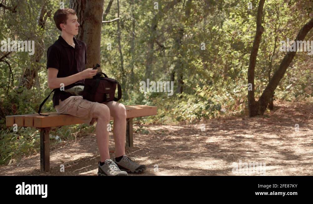 Man sitting in woods Stock Videos & Footage - HD and 4K Video Clips - Alamy