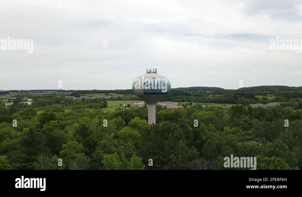Rotating aerial of water tower holding water tank, standing isolated ...