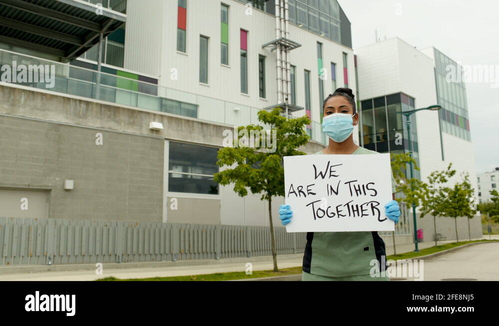 Indian woman, POC, nurse doctor wearing PPE uniform, gloves, mask ...