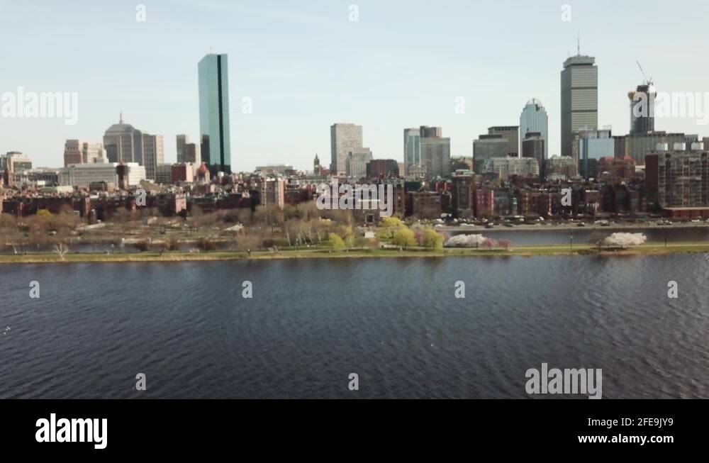 Boston Downtown Skyline With Iconic Towers From The Calm Waters Of ...
