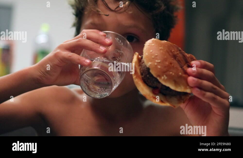 Boy taking a meal Stock Videos & Footage - HD and 4K Video Clips - Alamy