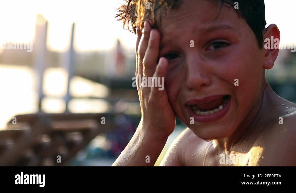 Tearful crying little boy. Child cries Stock Video Footage - Alamy