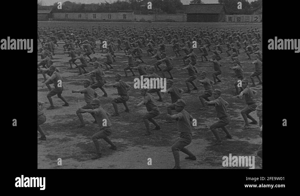 1940s: Soldiers in rows, lines practice combat maneuvers. Soldiers ...