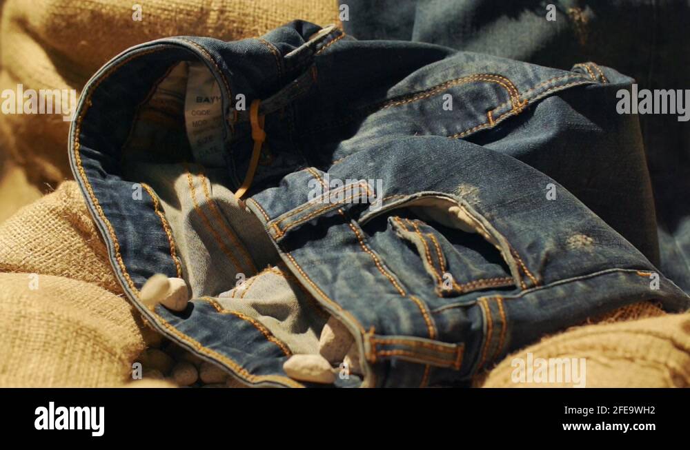 Holes in jeans Stock Videos & Footage - HD and 4K Video Clips - Alamy