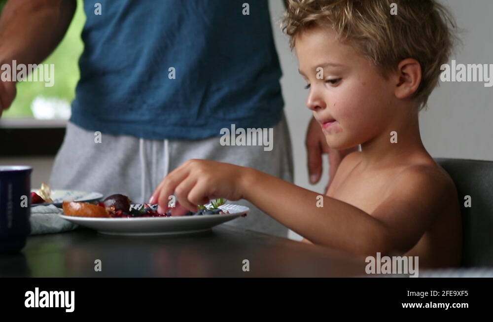 Boy eat fruit Stock Videos & Footage - HD and 4K Video Clips - Alamy