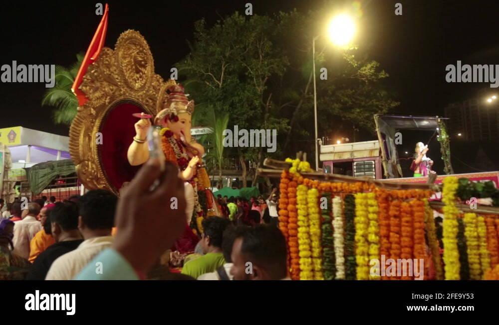Immersion of Lord Ganesha Idol and huge crowd at Girgaon Chowpatty in ...