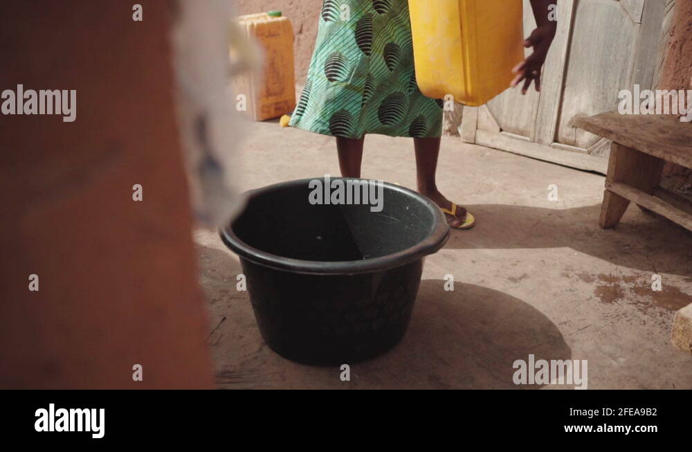 African woman water Stock Videos & Footage - HD and 4K Video Clips - Alamy