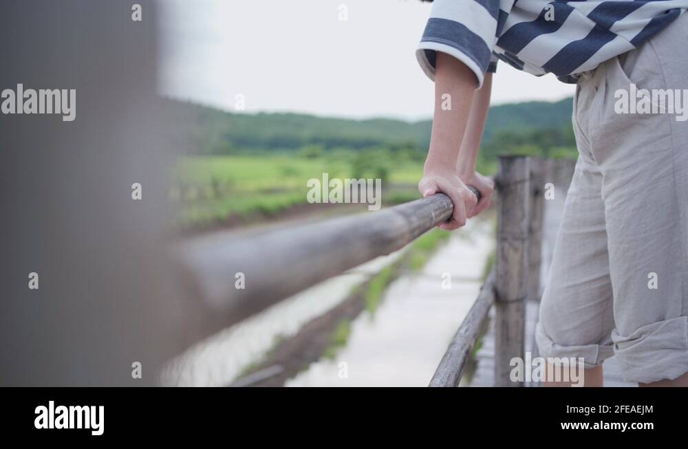 Leaning on hand rail Stock Videos & Footage - HD and 4K Video Clips - Alamy