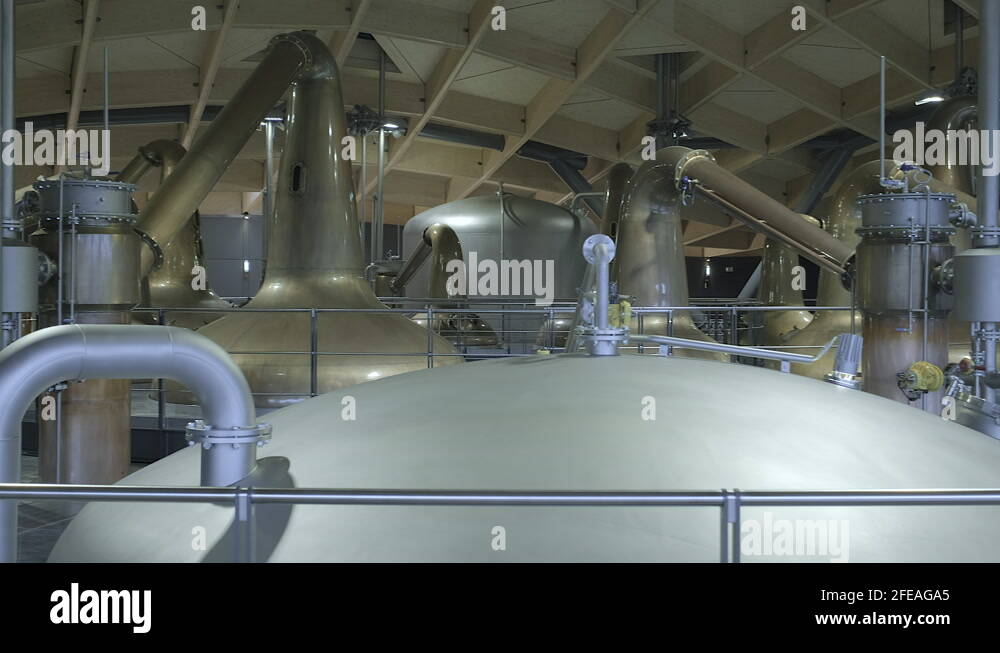 Interior pipework, copper stills and mash tuns highlighting the Stock ...