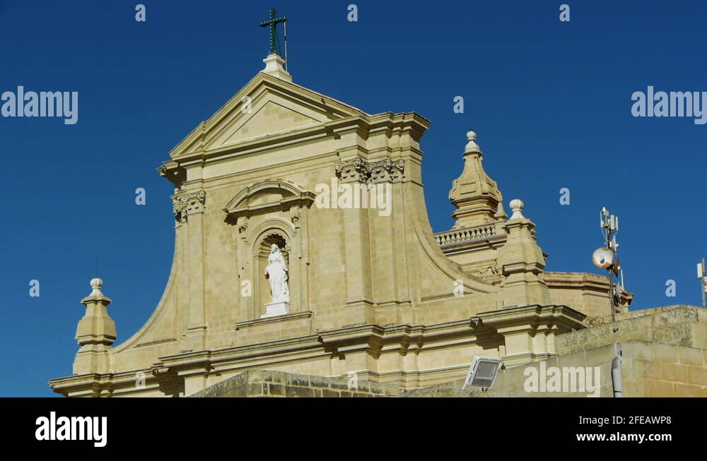 Old architectural classic church with a statue of Jesus Christ with ...