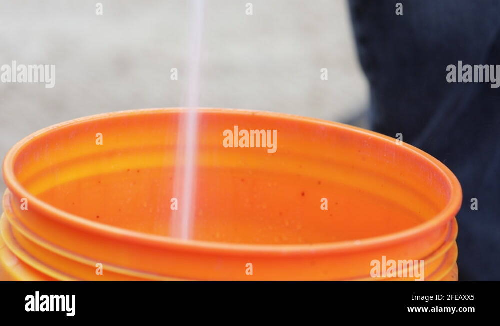 Fill up your bucket Stock Videos & Footage - HD and 4K Video Clips - Alamy