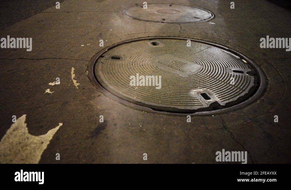 Manhole cover lines Stock Videos & Footage - HD and 4K Video Clips - Alamy