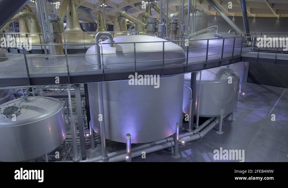 Interior pipework, copper stills and mash tuns highlighting the Stock ...