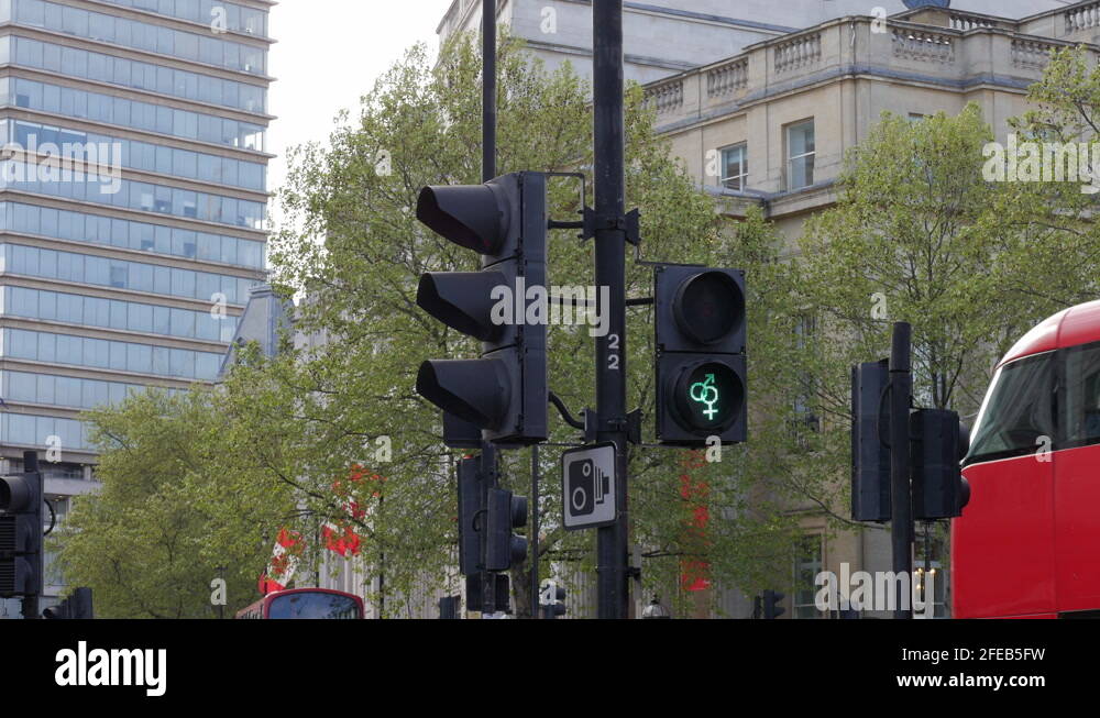 London pedestrian crossing traffic light represented as gender symbols ...
