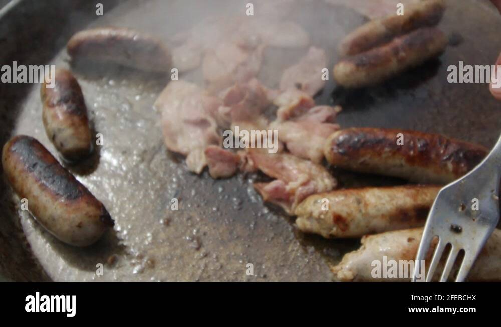 Sausages with bacon Stock Videos & Footage - HD and 4K Video Clips - Alamy