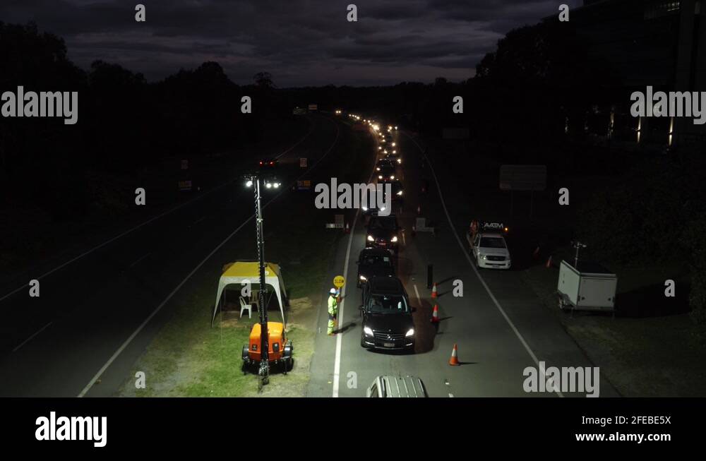 Long Queue Of Cars Waiting To Cross The Gold Coast Border - Traffic At ...