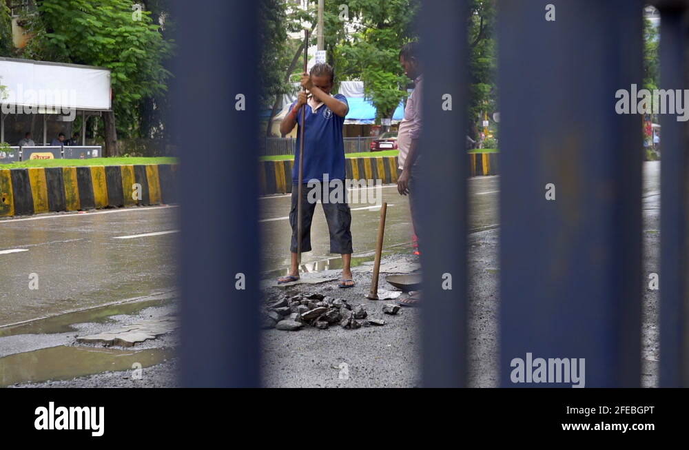 Fixing roads Stock Videos & Footage - HD and 4K Video Clips - Alamy