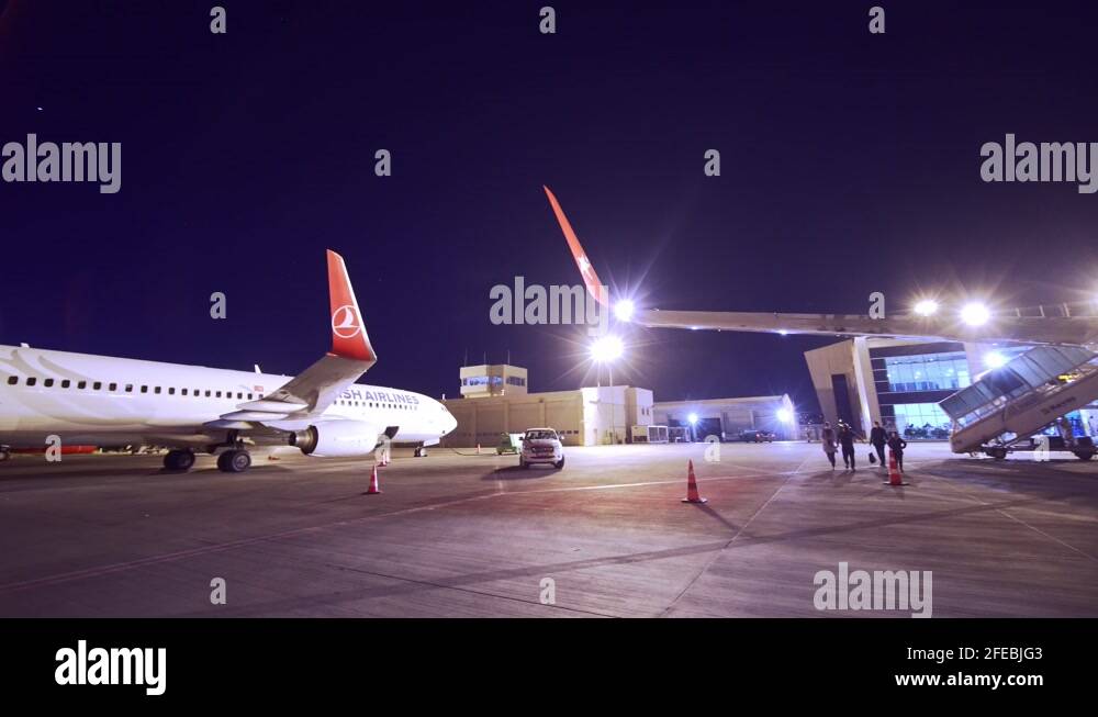 Turkish airline in Kayser airport, Turkey. People getting on the plane ...