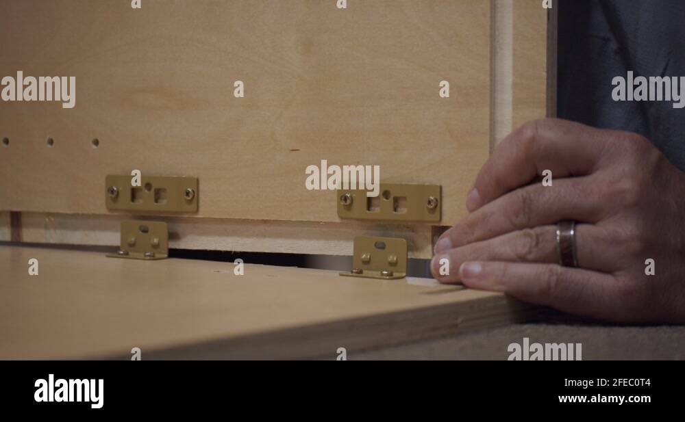 Assembling cabinets Stock Videos & Footage - HD and 4K Video Clips - Alamy