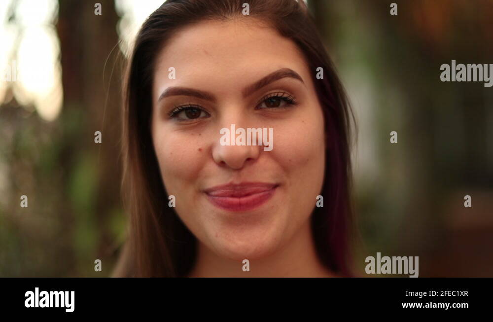 Young woman portrait looking at camera. Millennial pretty girl posing ...