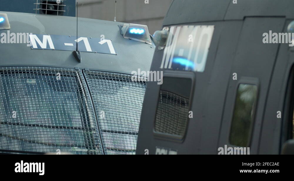 Norwegian riot police patrol cars with enforced windows and blue ...