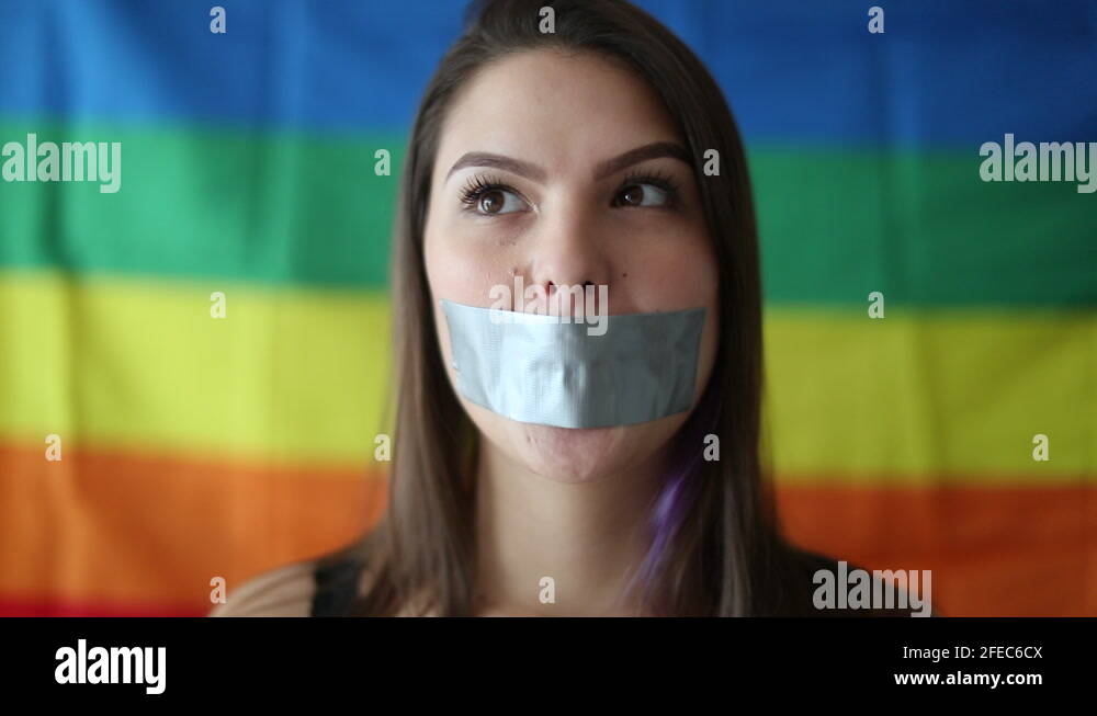 Young woman unable to speak. LGBT freedom of speech concept. Girl ...