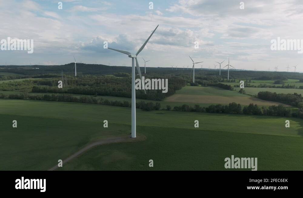 Wind turbines in green grass field Stock Videos & Footage - HD and 4K ...