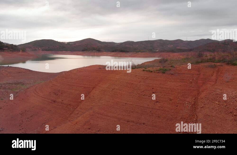 Extremely low water level in a reservoir suffering from a drought as ...