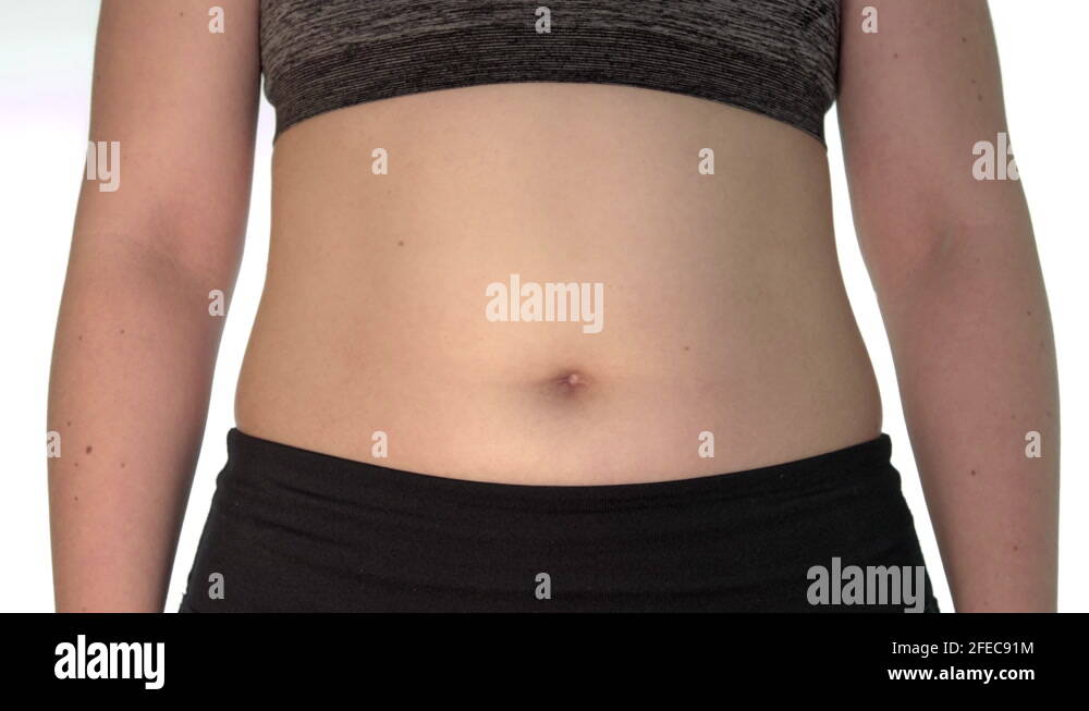 Woman's navel Stock Videos & Footage - HD and 4K Video Clips - Alamy