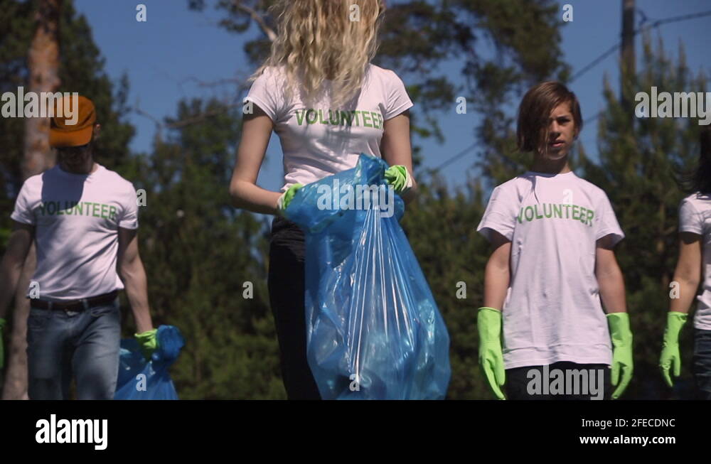 Young people family recycle plastic bottle collecting plastic waste for ...