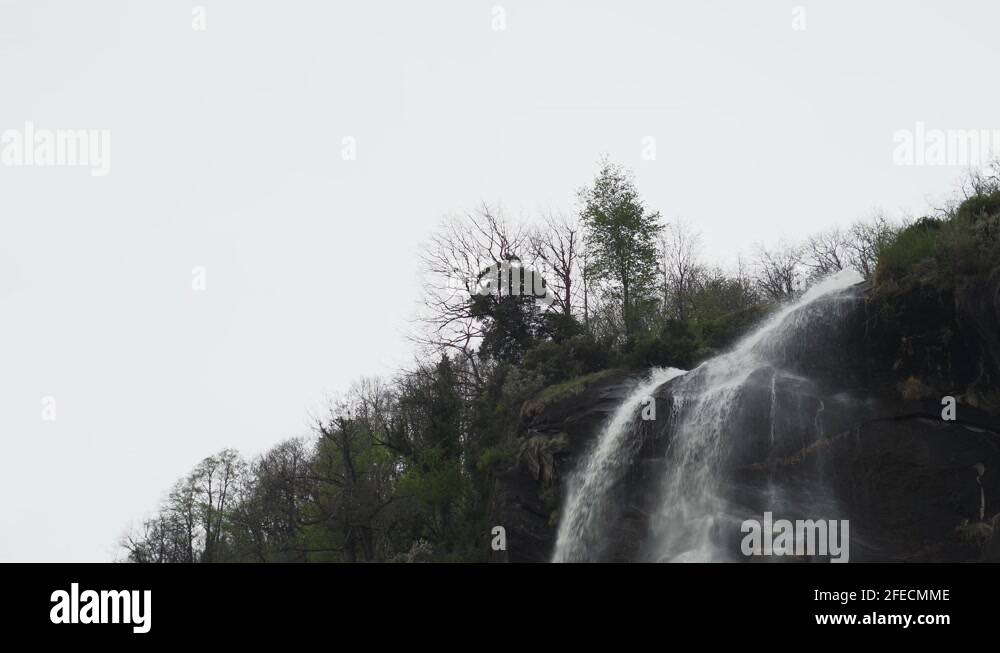 Fresh water of Acquafraggia torrent falling vertically from the edge of ...