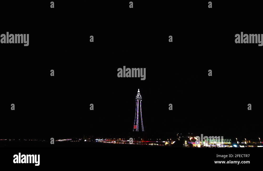 Blackpool tower illuminates multiple colours in the dark night sky for ...