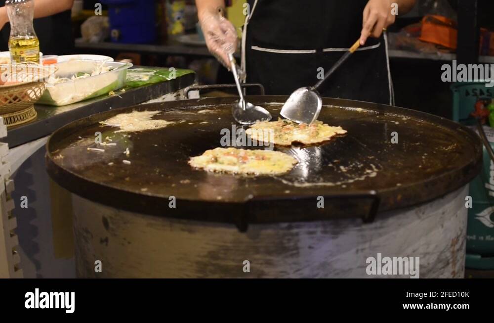Woman cooking roti Stock Videos & Footage - HD and 4K Video Clips - Alamy