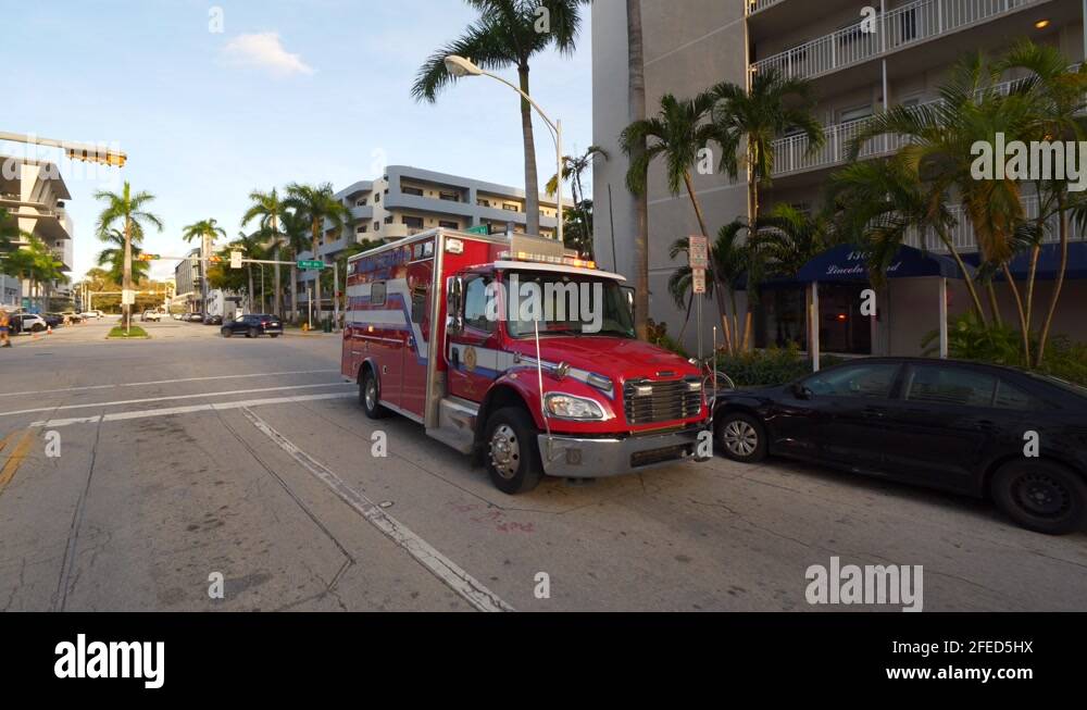 Miami Beach fire rescue ambulance with flashing lights Stock Video ...