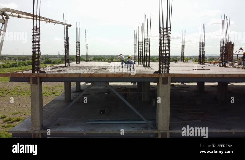 Casted concrete column at the construction site. Provided protruding ...
