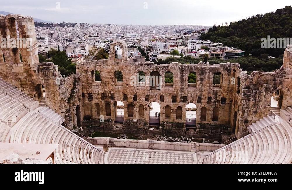 Odeon of Herodes Atticus located at the foot of the Acropolis in tilting Stock Video Footage - Alamy