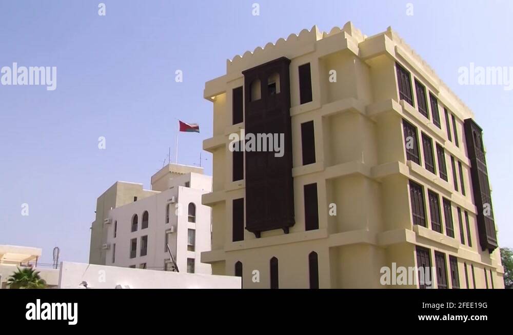 Buildings in Muscat, Oman. Flag of Oman Stock Video Footage - Alamy